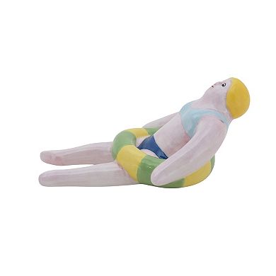 Celebrate Together™ Summer Lounging Ceramic Swimmer Table Decor